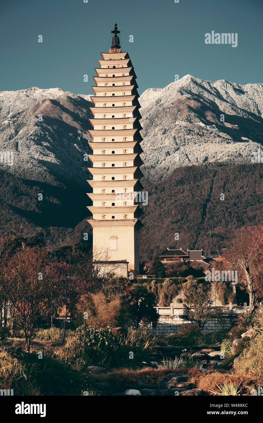 Ancient pagoda in Dali old town with snow capped Mt Cangshan, Yunnan ...