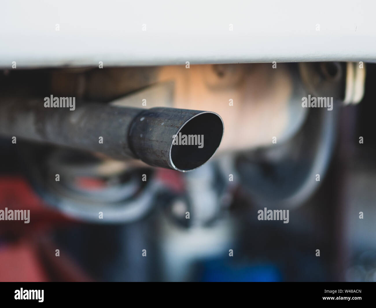 Close up of a car dual exhaust pipe Stock Photo - Alamy