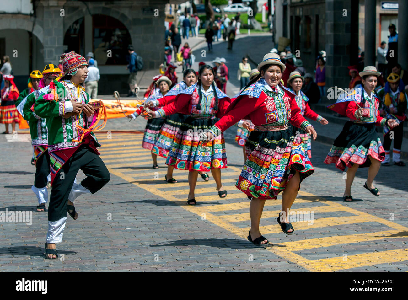 Dancers and musicians dressed in colourful Peruvian costume perform at ...