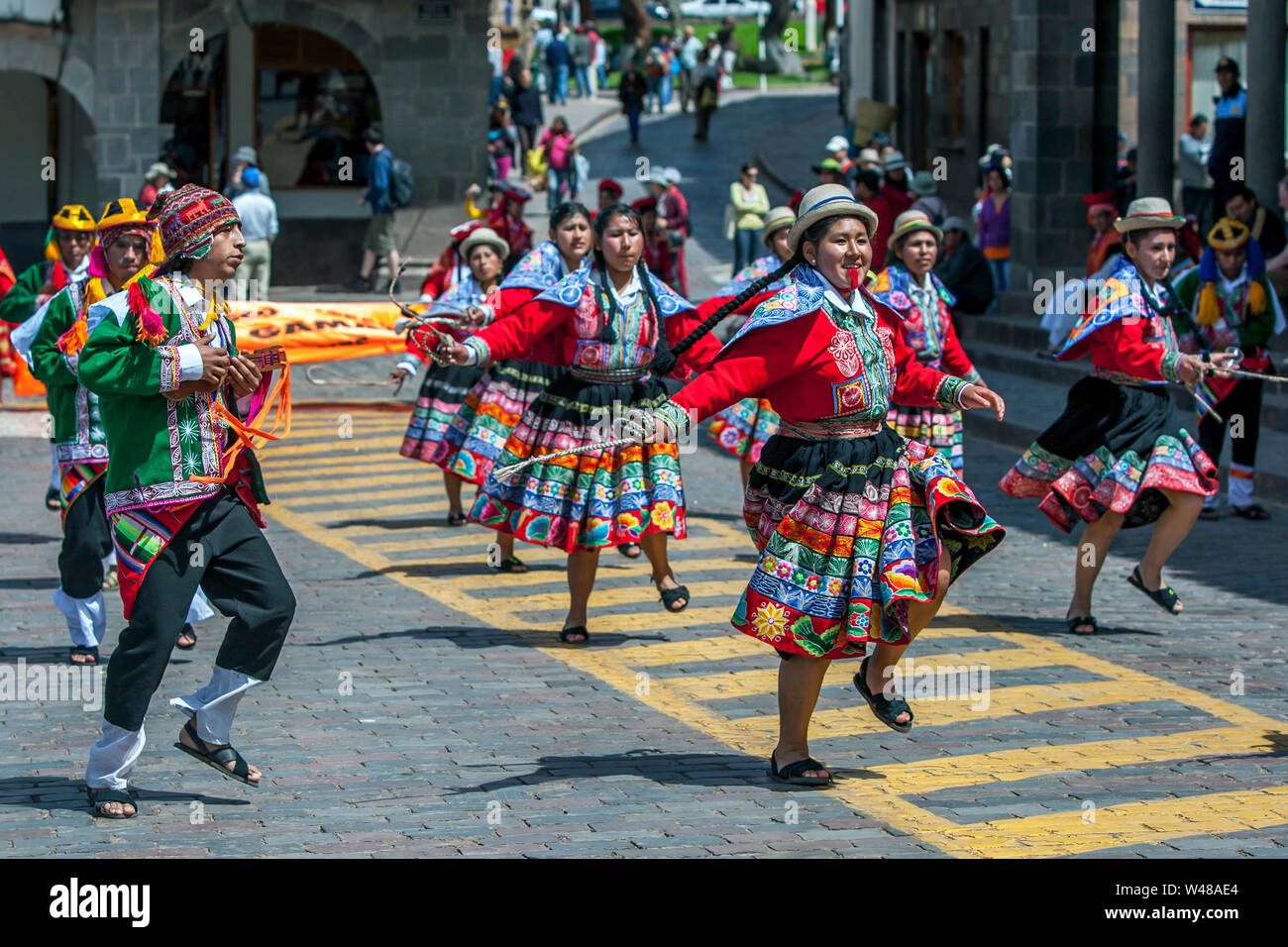 Dancers and musicians dressed in colourful Peruvian costume perform at ...