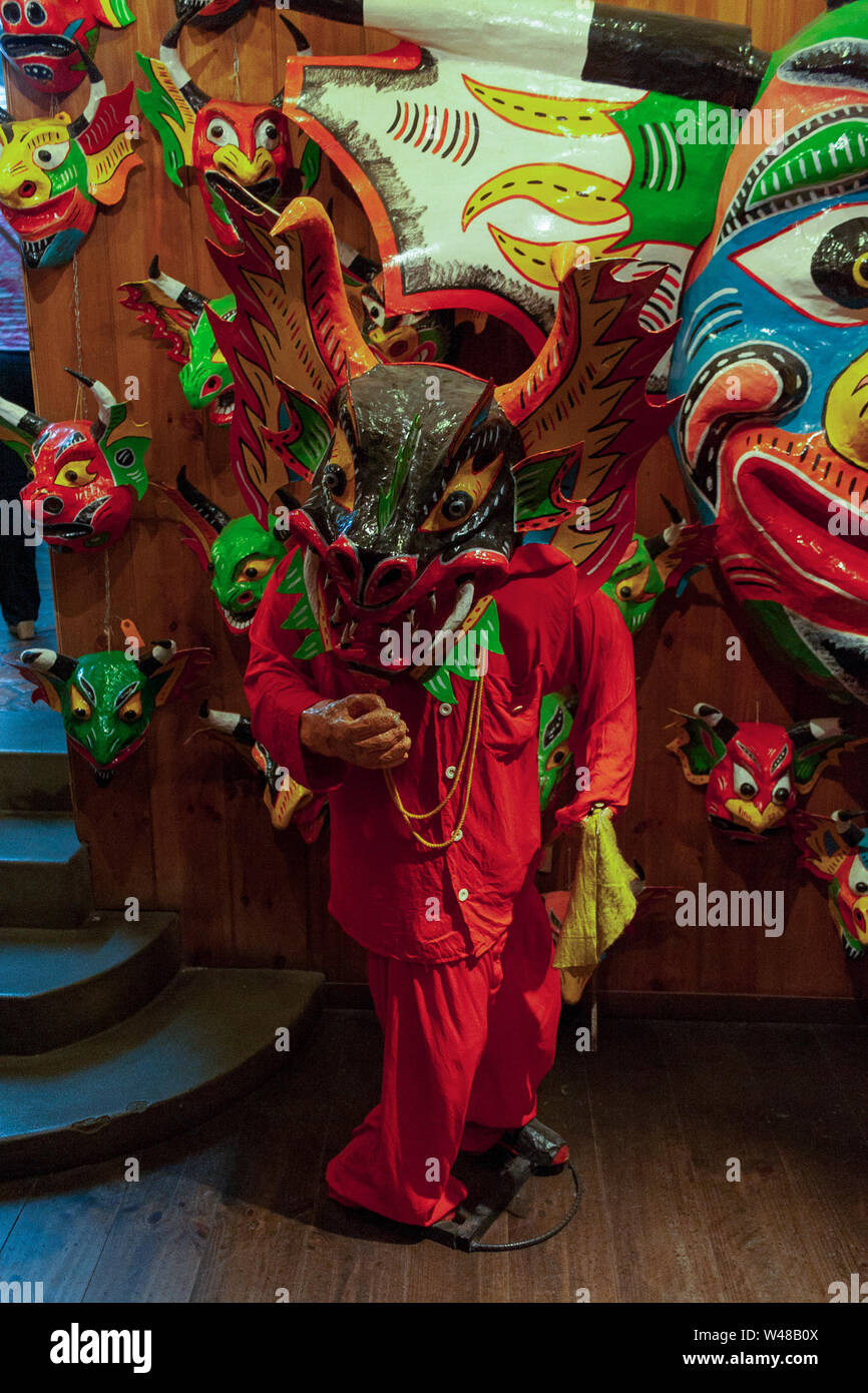 Iconic masks and mannequins wearing costumes from Yare Devils dancing ...