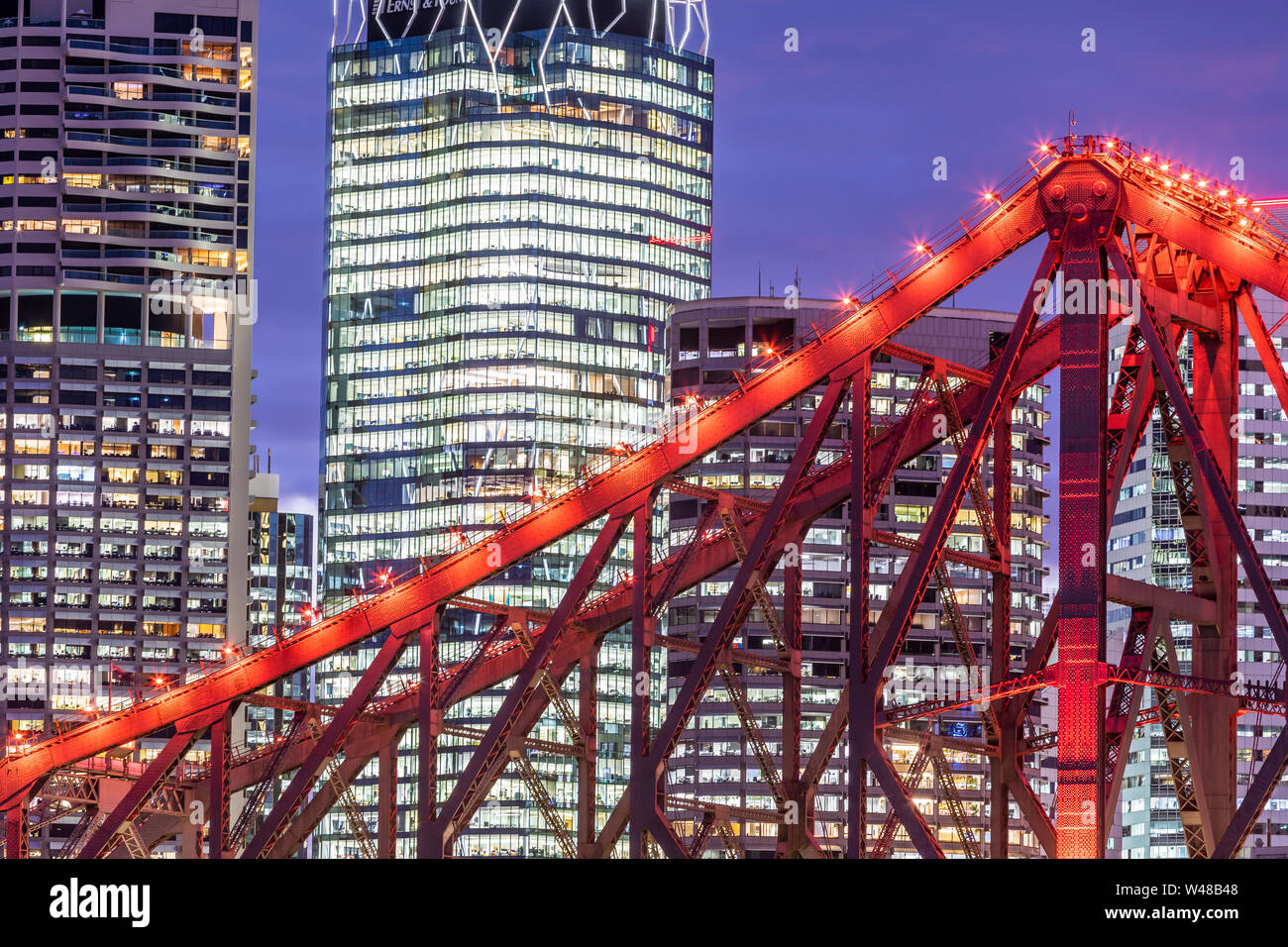 Lights turning on at blue hour over the Story Bridge Brisbane Australia ...