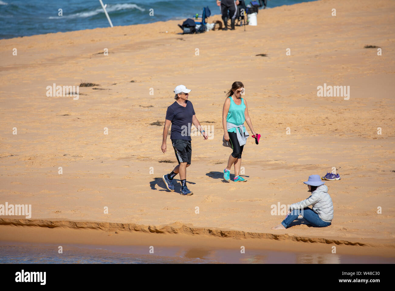 Man woman walk beach hi-res stock photography and images - Alamy