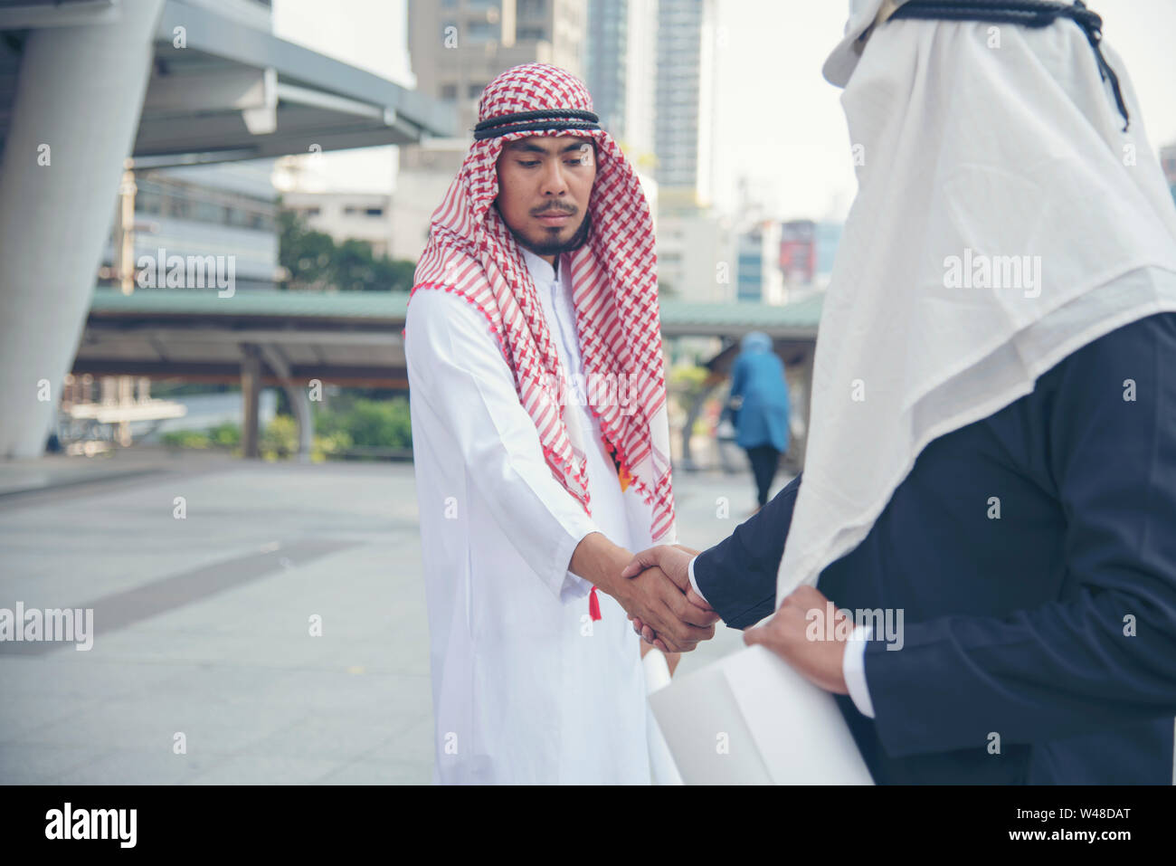 Teamwork concept. friendship business mans shaking hands together ...