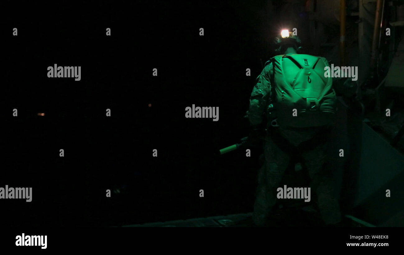 U.S. and Australian Special Operations Forces (SOF) conduct a military ...