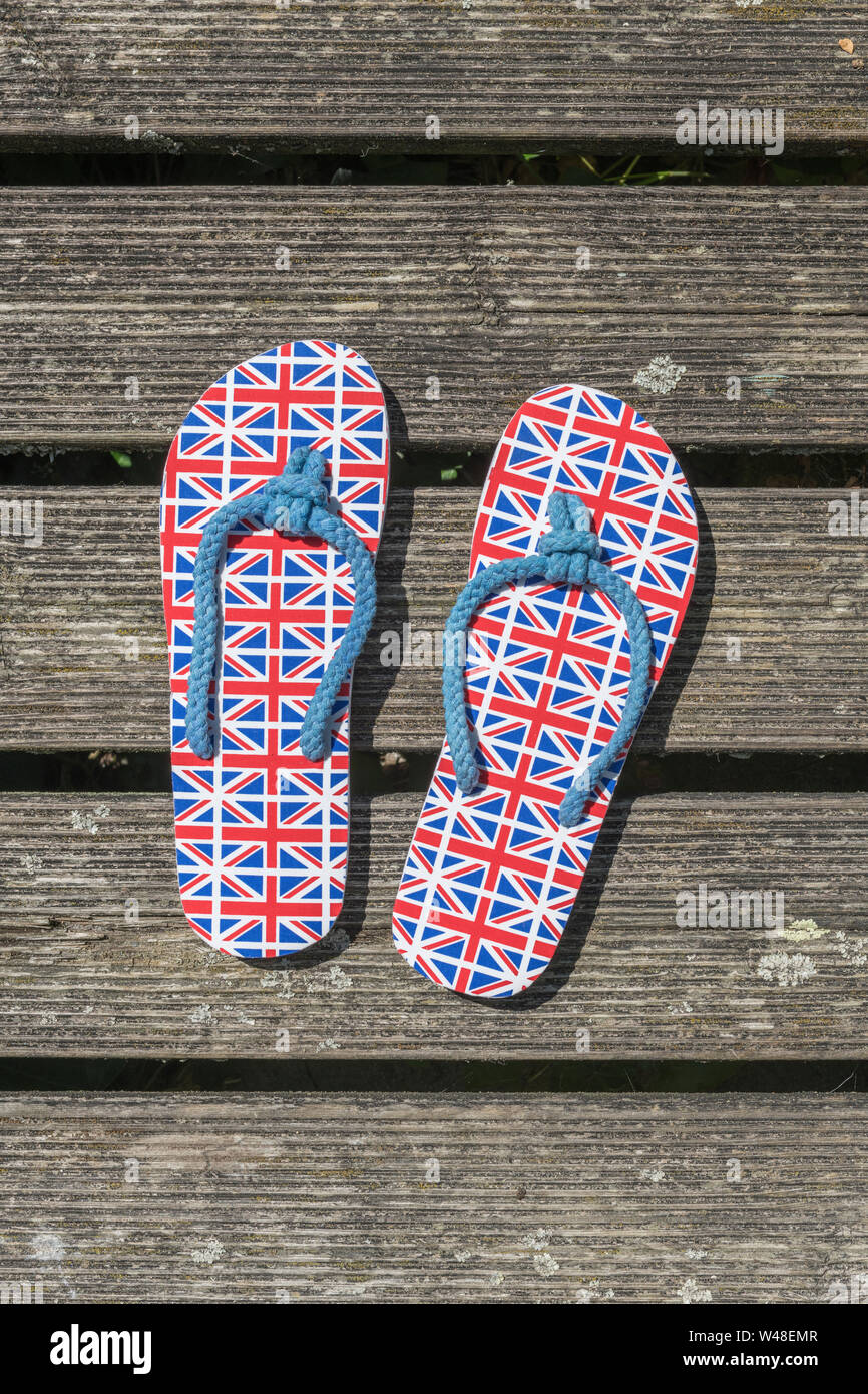 GB flag / Union Jack flip flops on wood decking - for 2021 UK ...