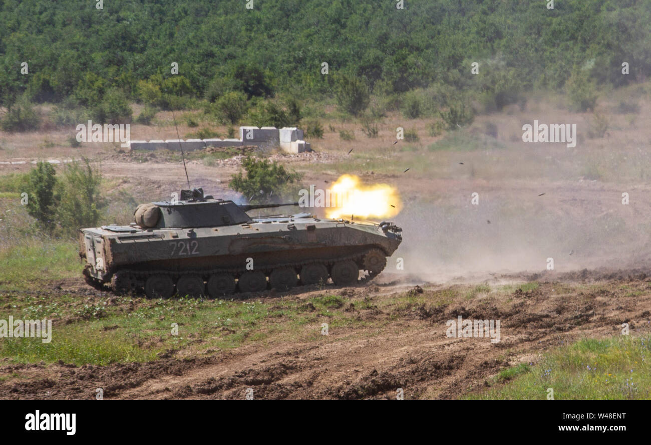 A Bulgarian BMP-1 infantry fighting vehicle engages its target during a ...