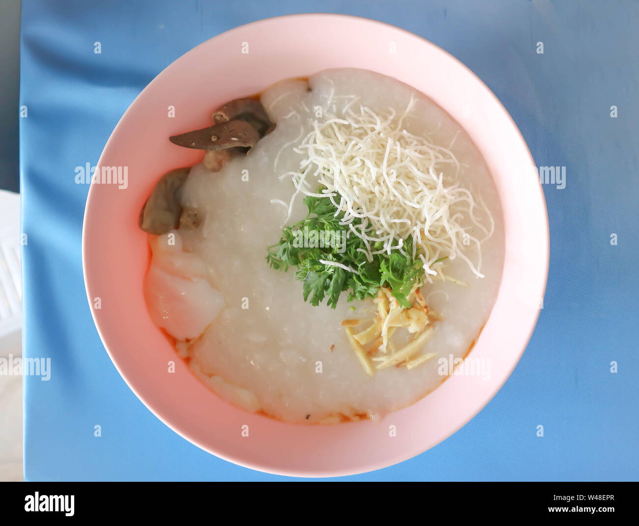rice gruel, rice porridge or congee dish Stock Photo - Alamy