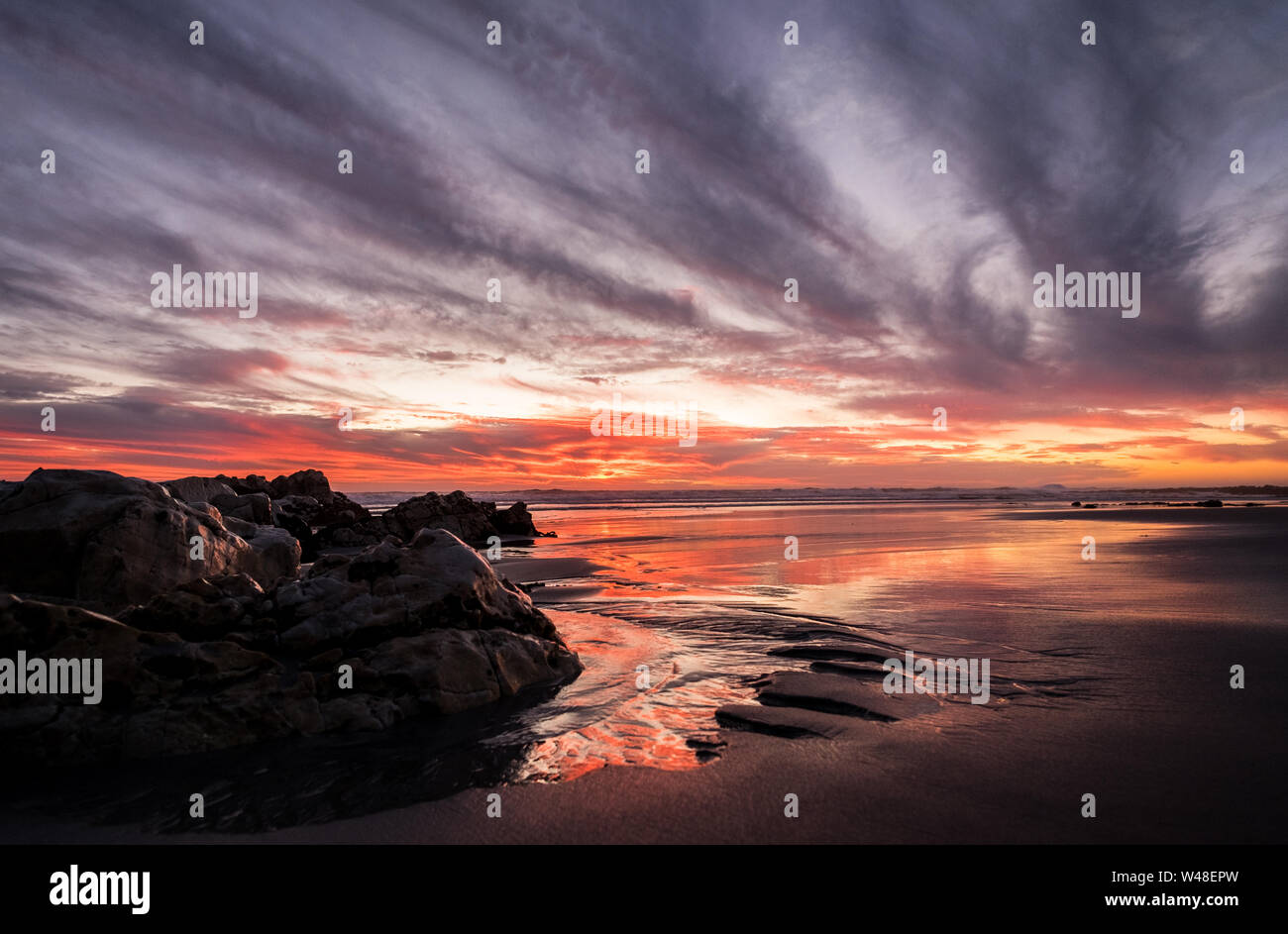 Beautiful sunset on remote beach hi-res stock photography and images ...