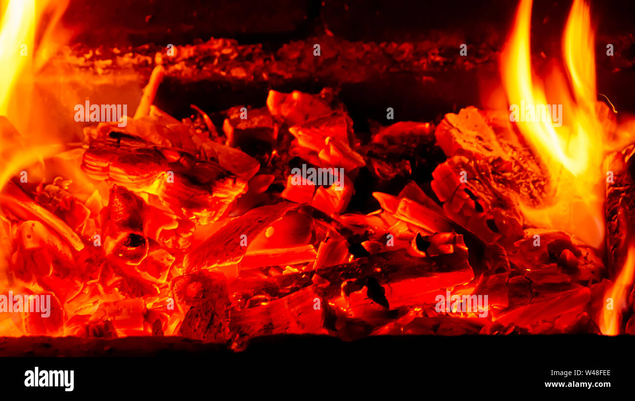 Wallpaper with a bright fire inside the brazier. Flame of fire ...