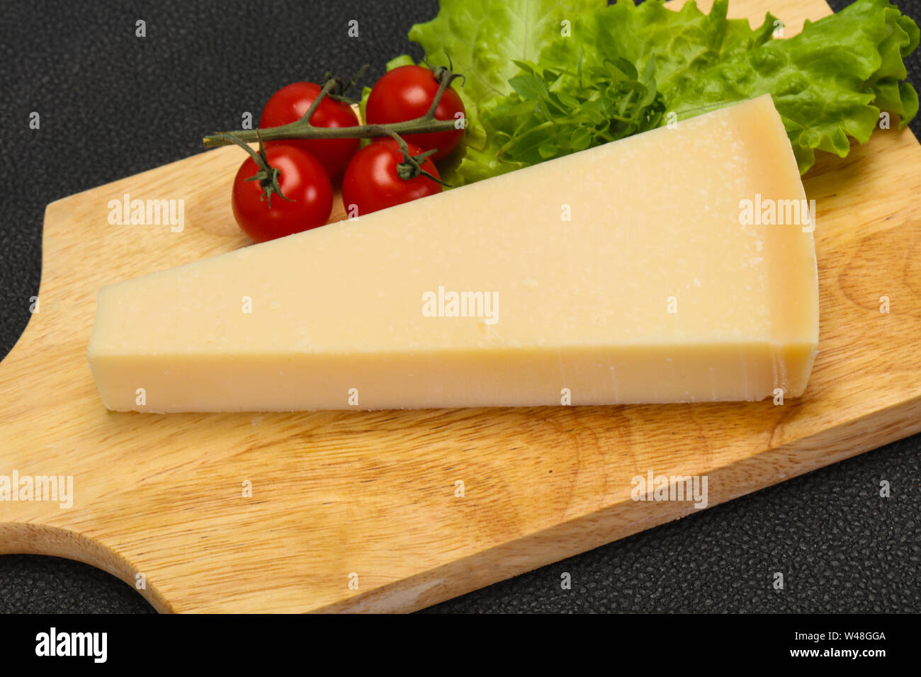 Italian traditional parmesan cheese triangle served salad Stock Photo ...