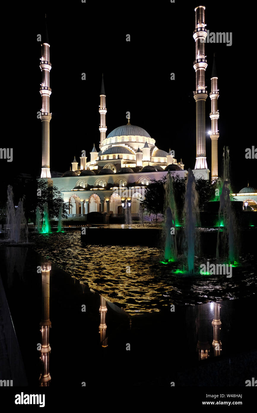 View of Akhmad Kadyrov Mosque illuminated at night in Grozny the ...