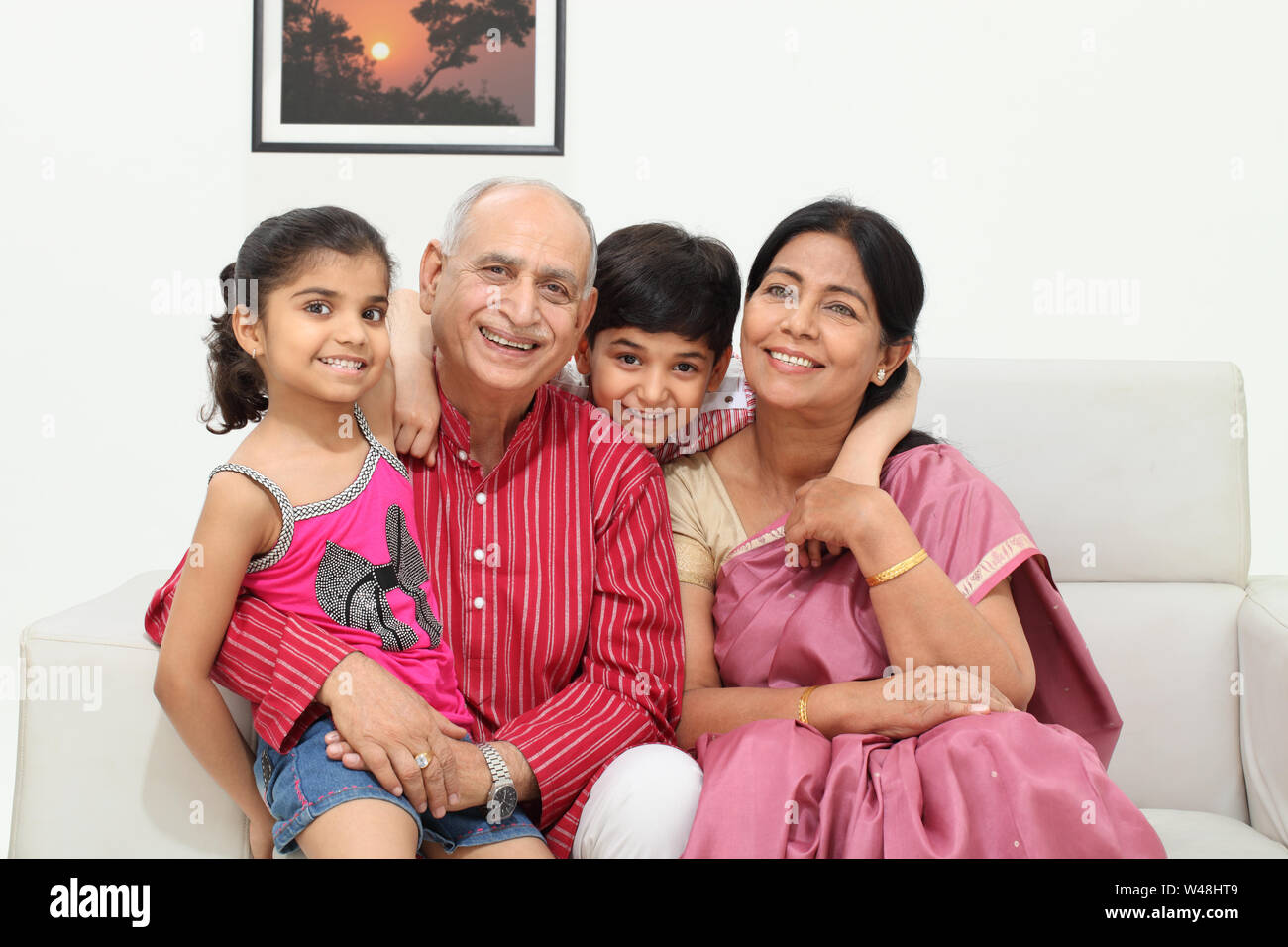 Family smiling together Stock Photo - Alamy