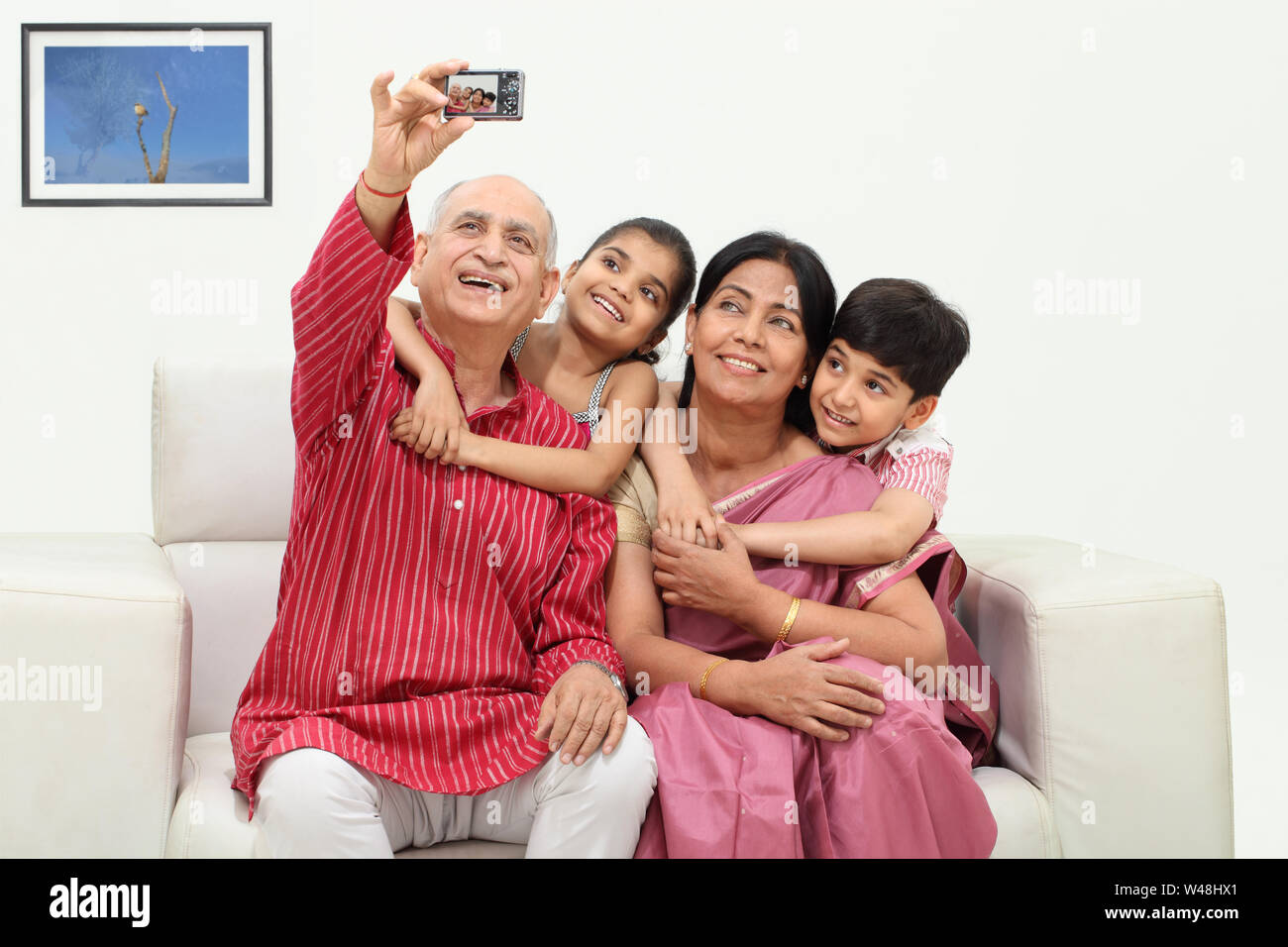 Indian family taking picture themselves hi-res stock photography and ...