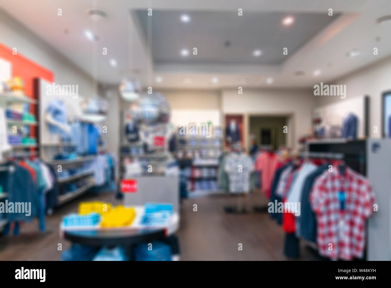 Interior clothing store. Blurred background Stock Photo - Alamy