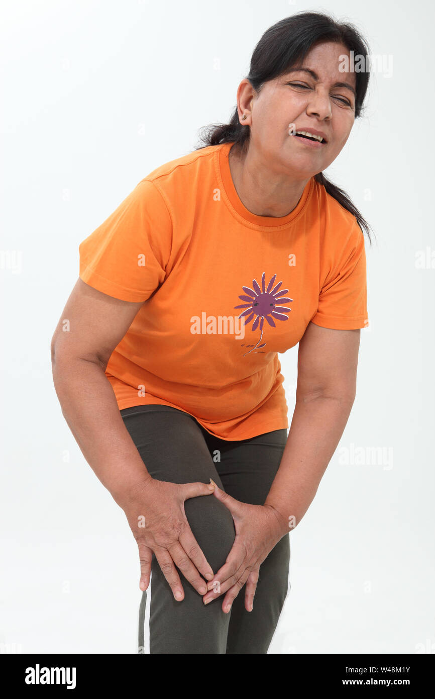 Woman knee joint 60s hi-res stock photography and images - Alamy