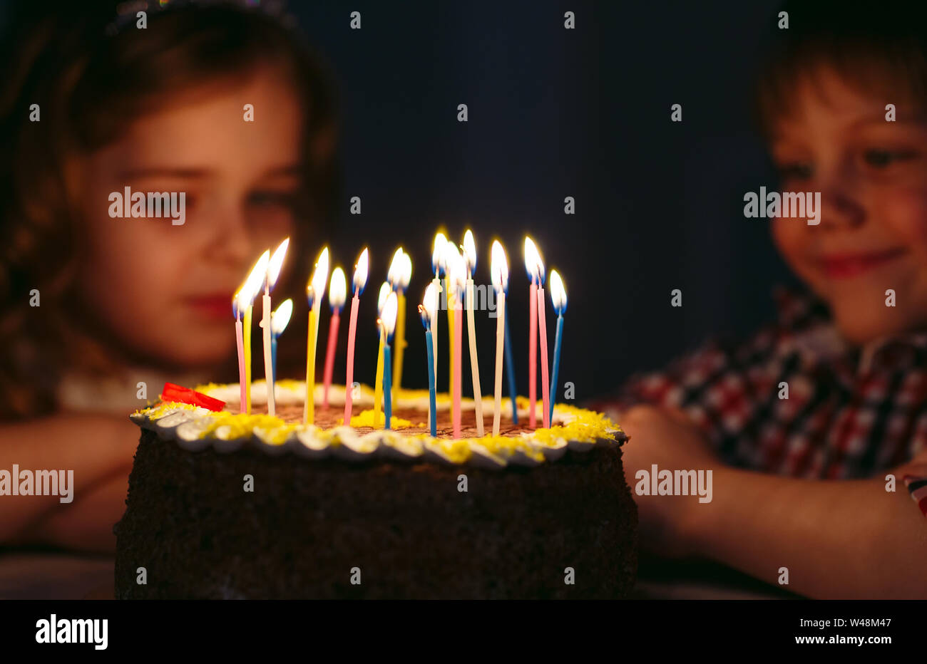 Children's birthday. Children near a birthday cake with candles Stock ...