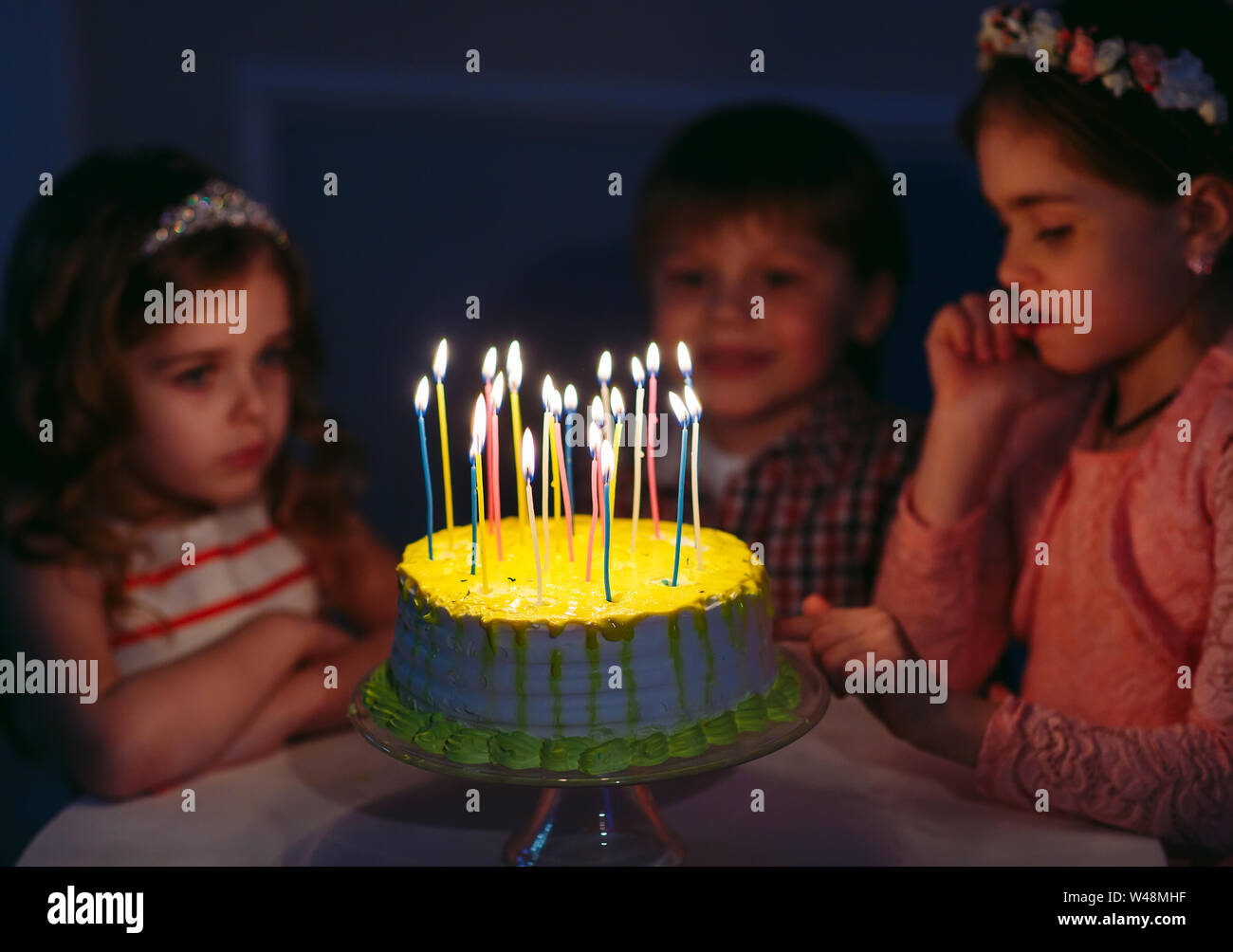 Children's birthday. Children near a birthday cake with candles Stock ...