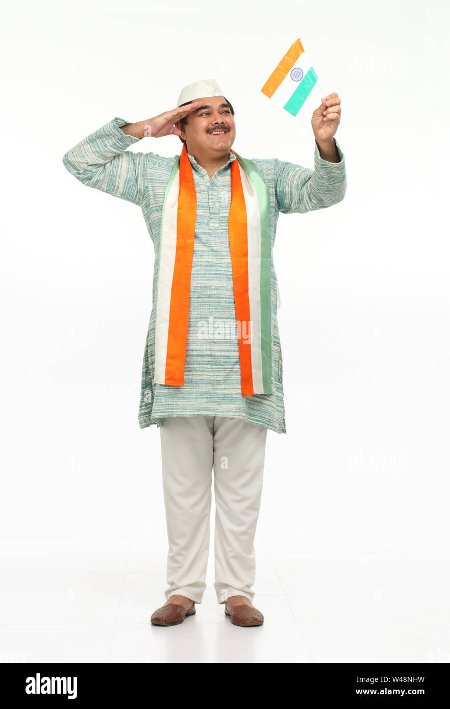 Politician saluting with Indian Flag Stock Photo - Alamy
