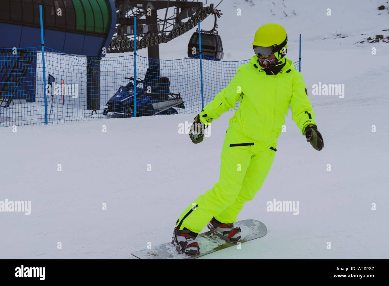 Yellow ski suit hi-res stock photography and images - Alamy