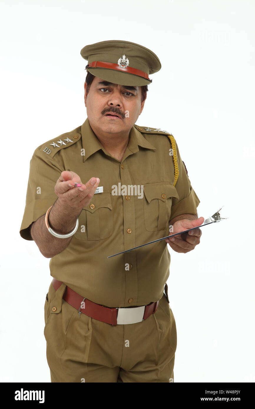 Mature police officer writing hi-res stock photography and images - Alamy