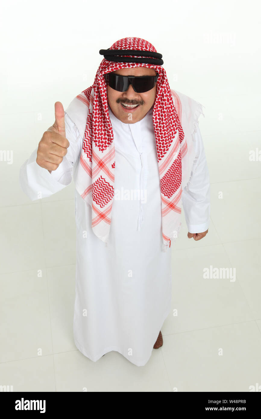 Arabian man showing thumbs up sign Stock Photo - Alamy