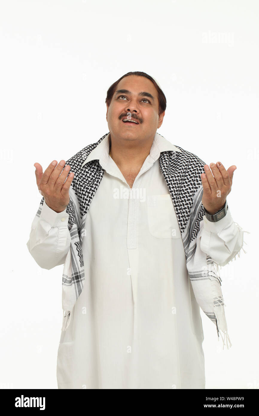 Muslim man praying Stock Photo - Alamy