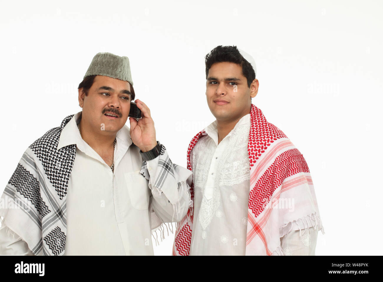 Indian muslim men, standing hi-res stock photography and images - Alamy