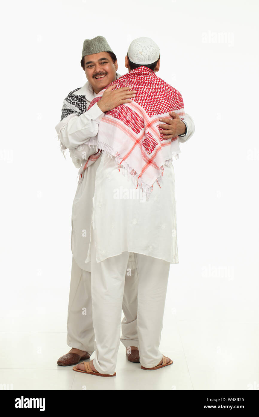 Smiling muslim men hi-res stock photography and images - Alamy