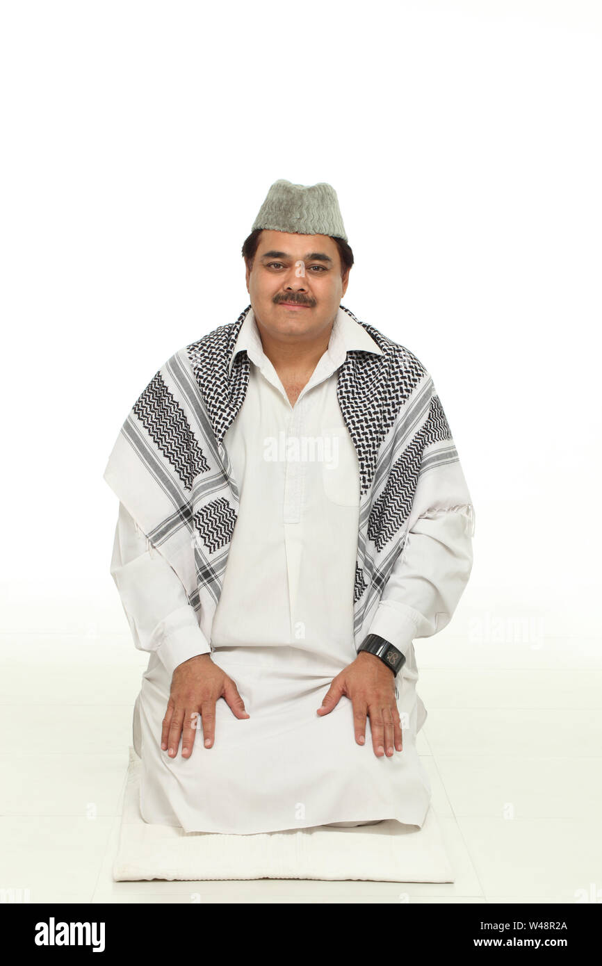 Muslim man praying namaz Stock Photo - Alamy