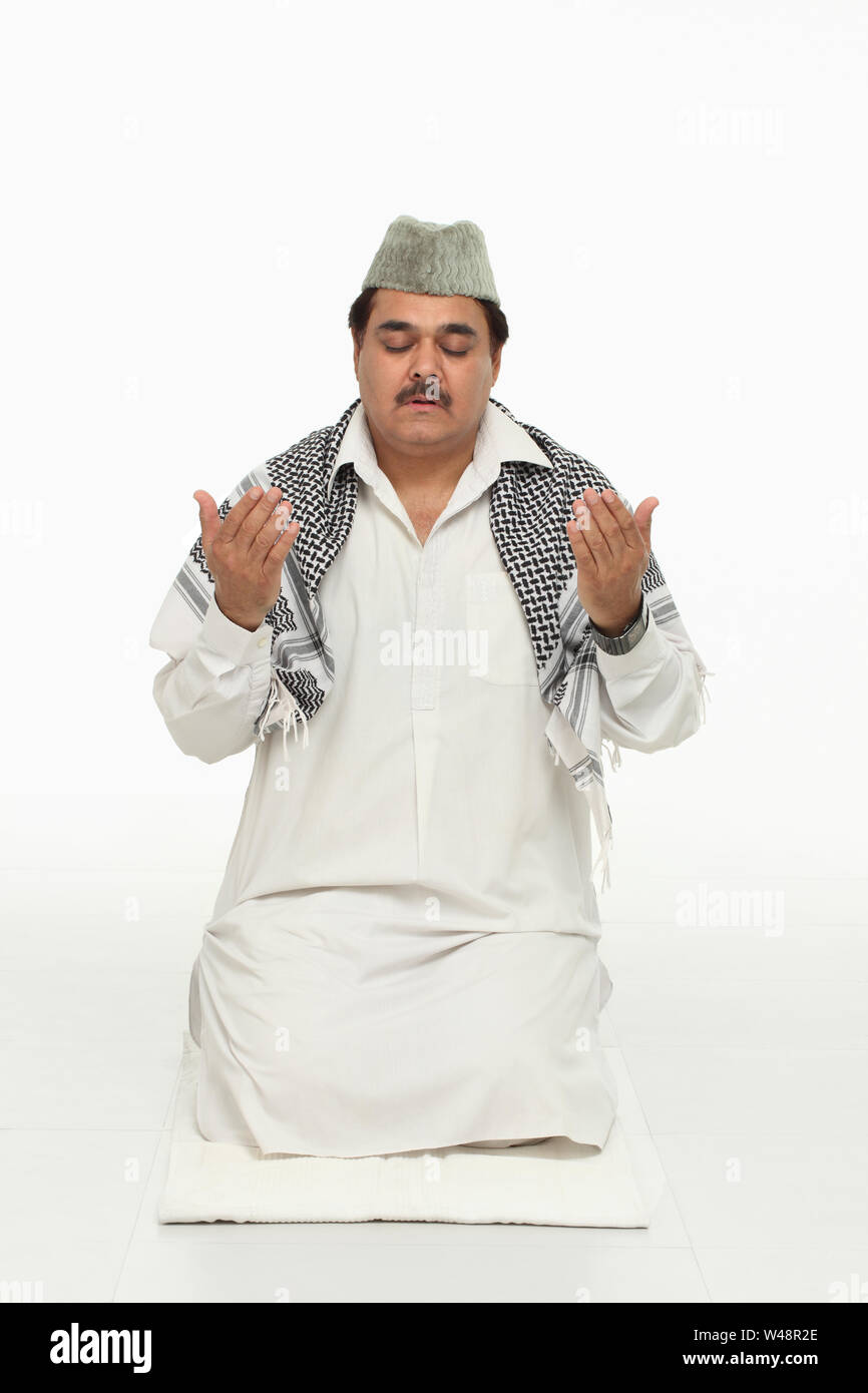 Muslim man praying namaz Stock Photo - Alamy