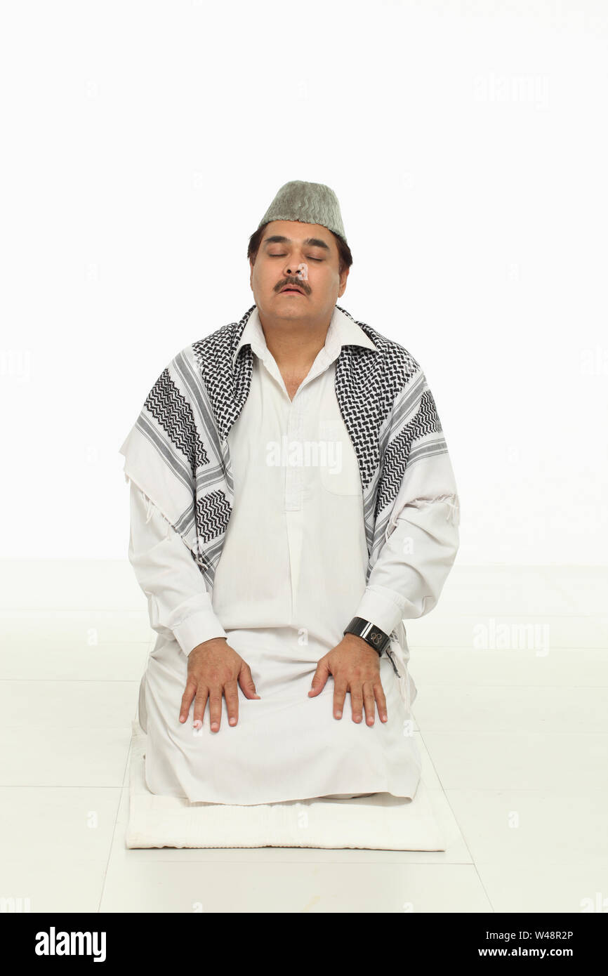 Muslim man praying namaz Stock Photo - Alamy