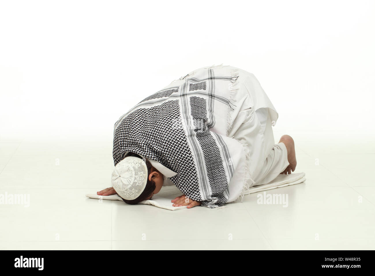 Muslim man praying namaz Stock Photo - Alamy