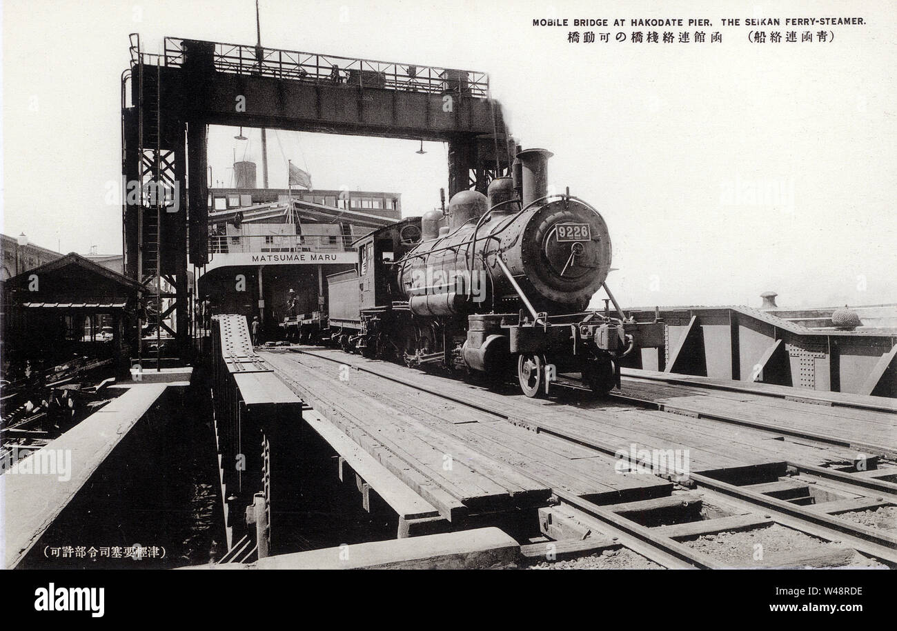 [ 1920s Japan - Steam Locomotive at Ferry ] — A steam locomotive pulls ...