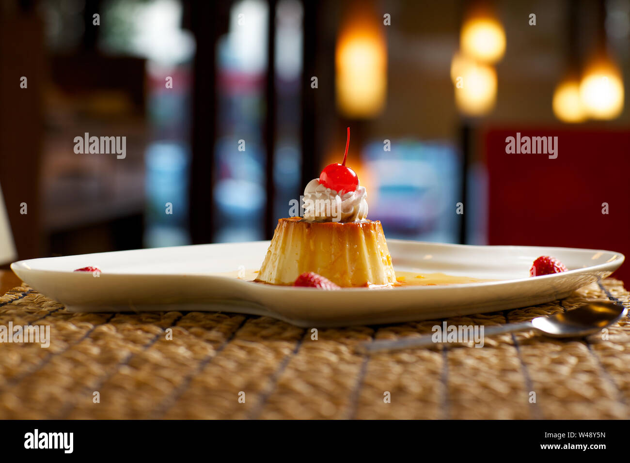 Custard dessert served with fruit hi-res stock photography and images ...