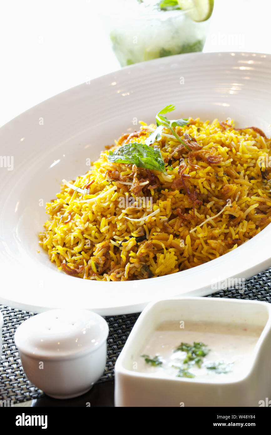 Fried rice served in a plate Stock Photo - Alamy