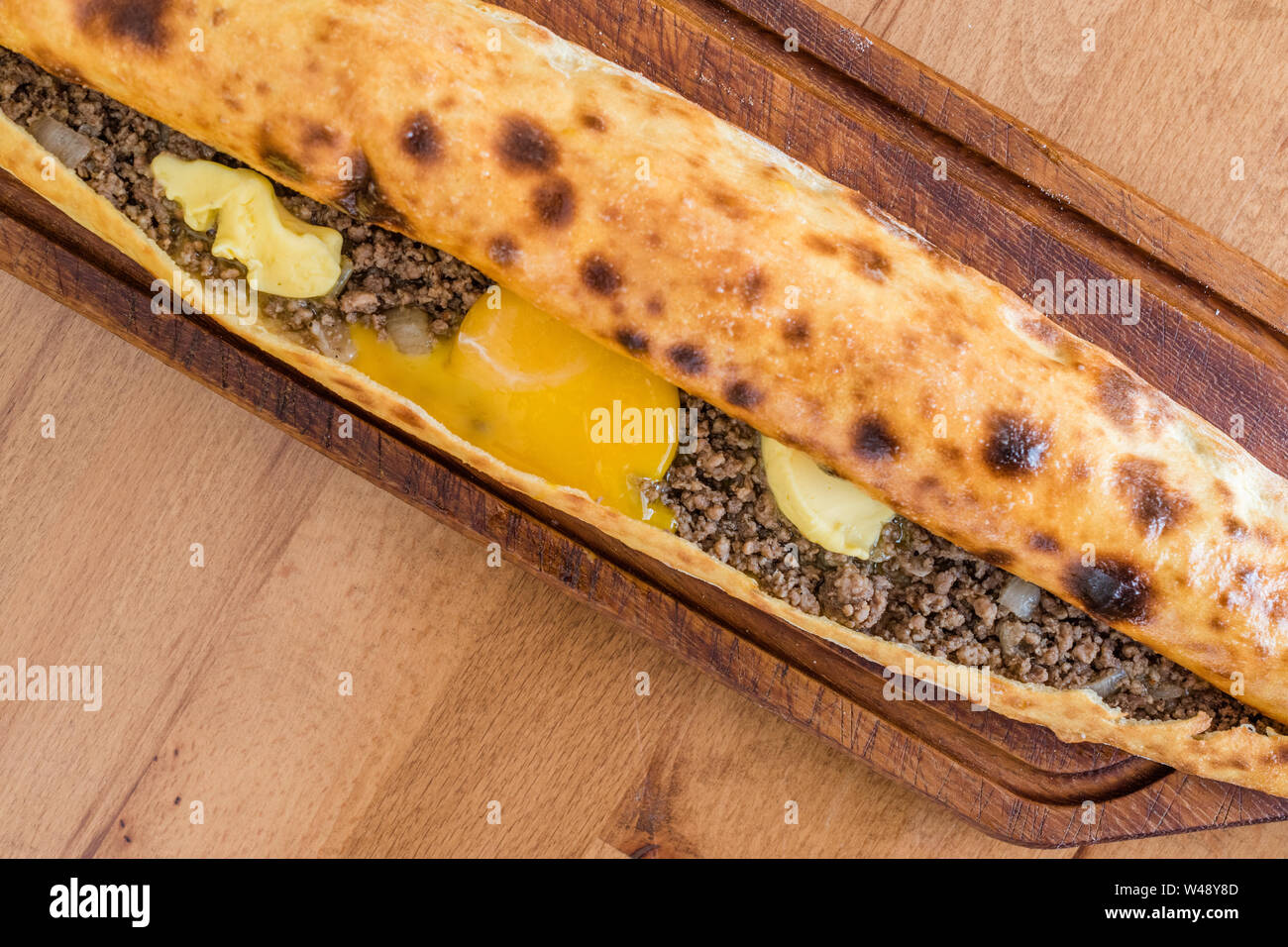 Traditional Turkish Pide at Kebab Restaurant on Wooden Table. Turkish ...