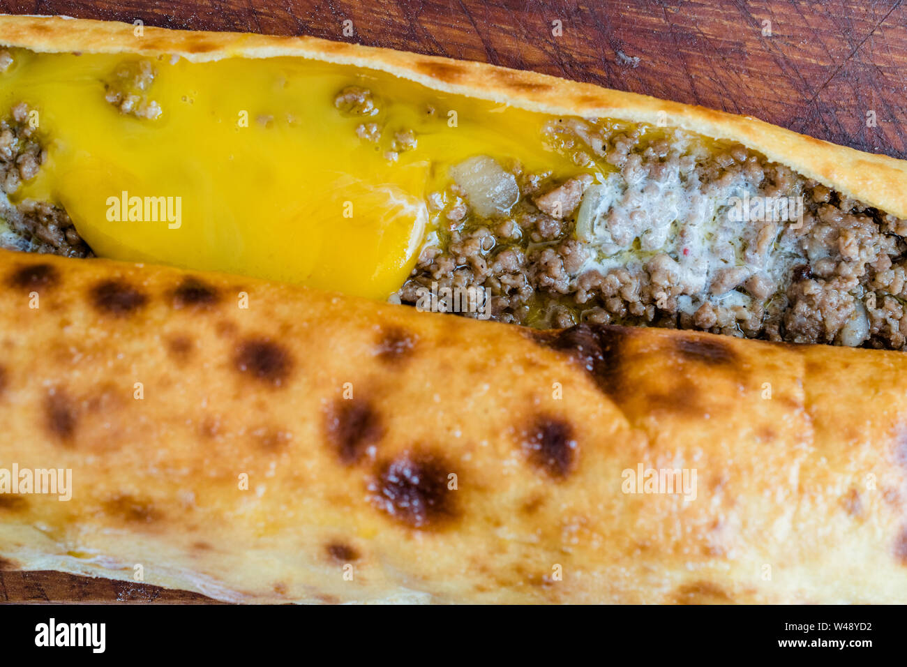 Traditional Turkish Pide at Kebab Restaurant on Wooden Table. Turkish ...