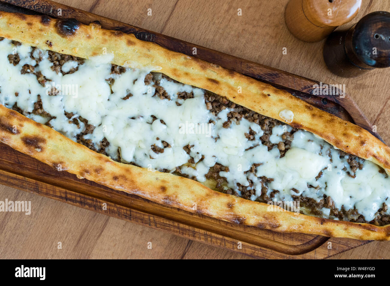 Traditional Turkish Pide at Kebab Restaurant on Wooden Table. Turkish ...