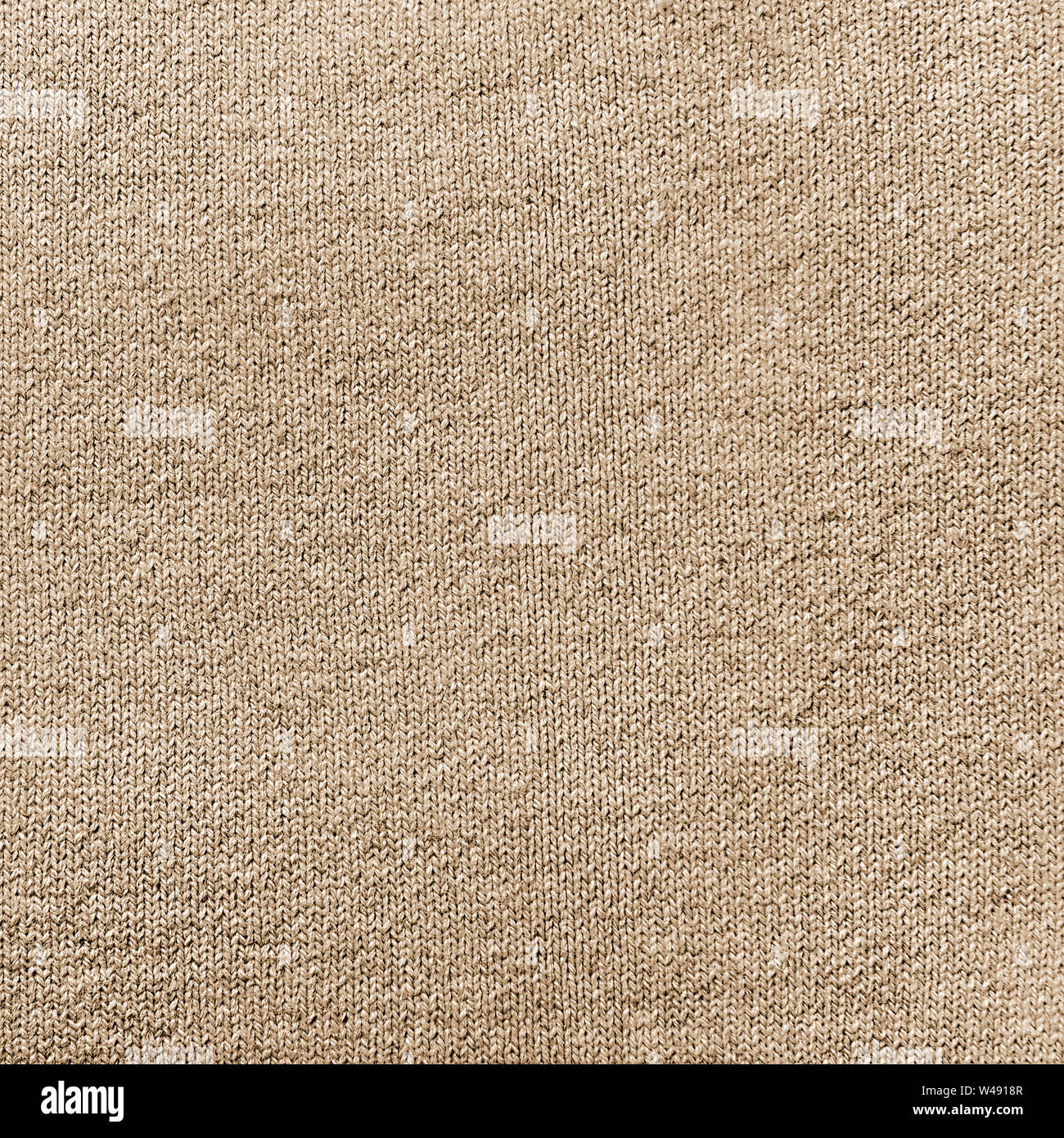 Beige Hand-knitted fabric background Stock Photo - Alamy