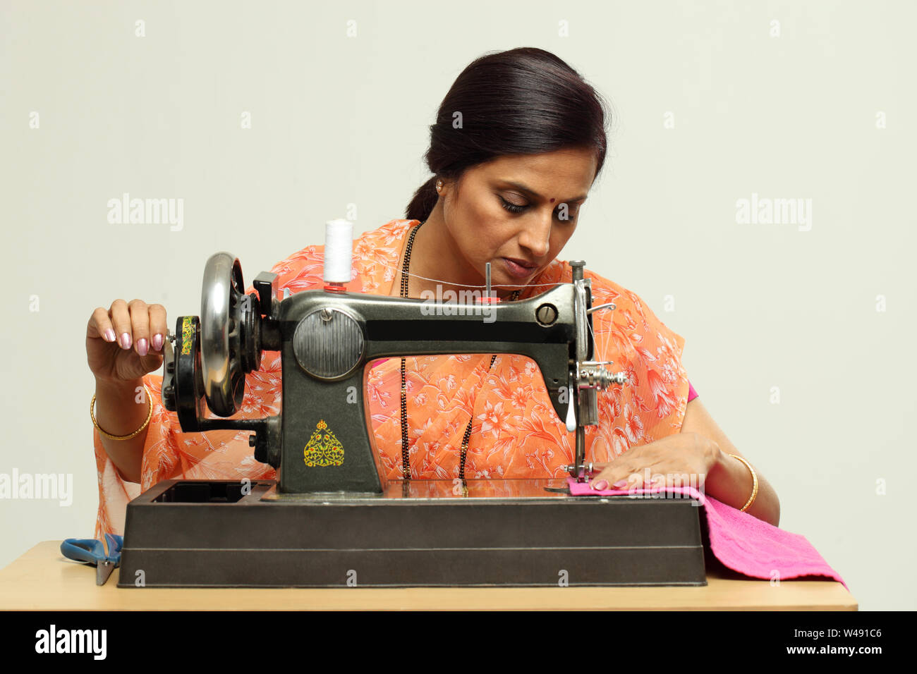 India woman holding fabric hi-res stock photography and images - Alamy