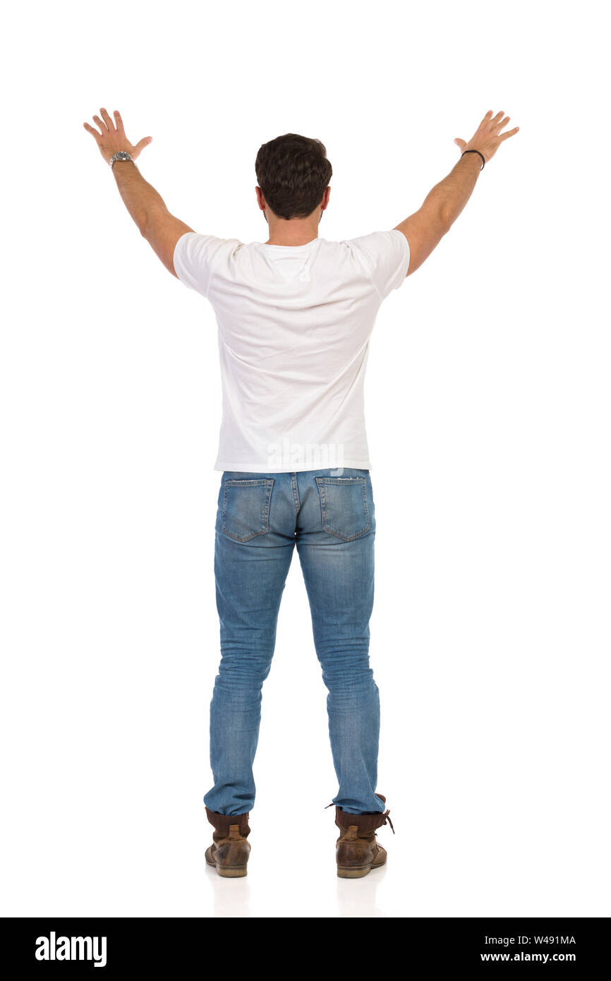 Full length waving rear view hi-res stock photography and images - Alamy