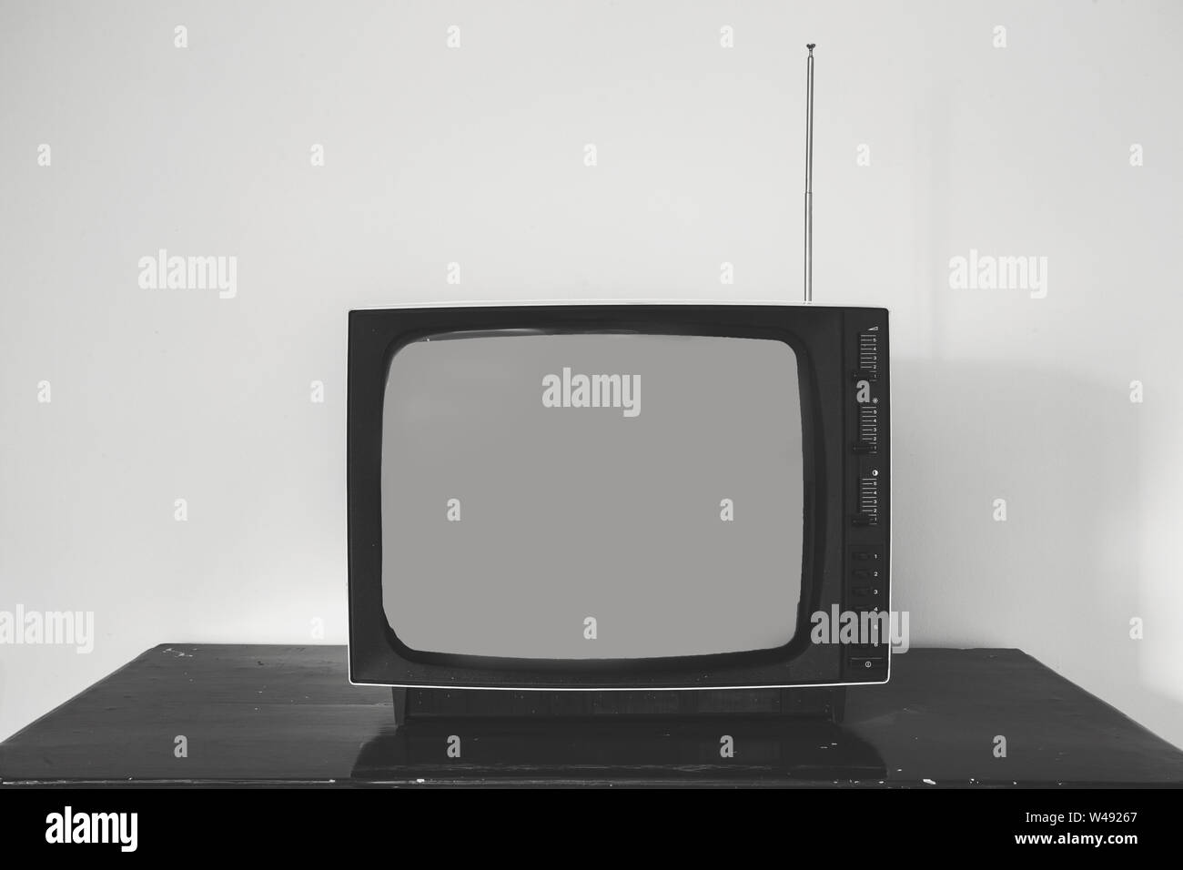 Retro old television receiver on the table front, vintage design black ...