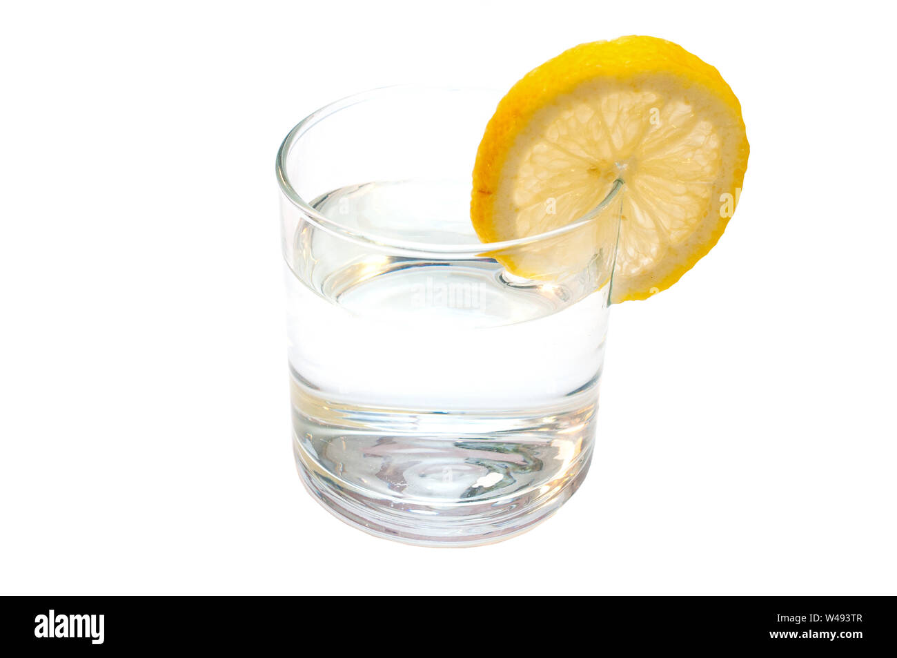Glass of pure water with lemon isolated on a white background Stock ...