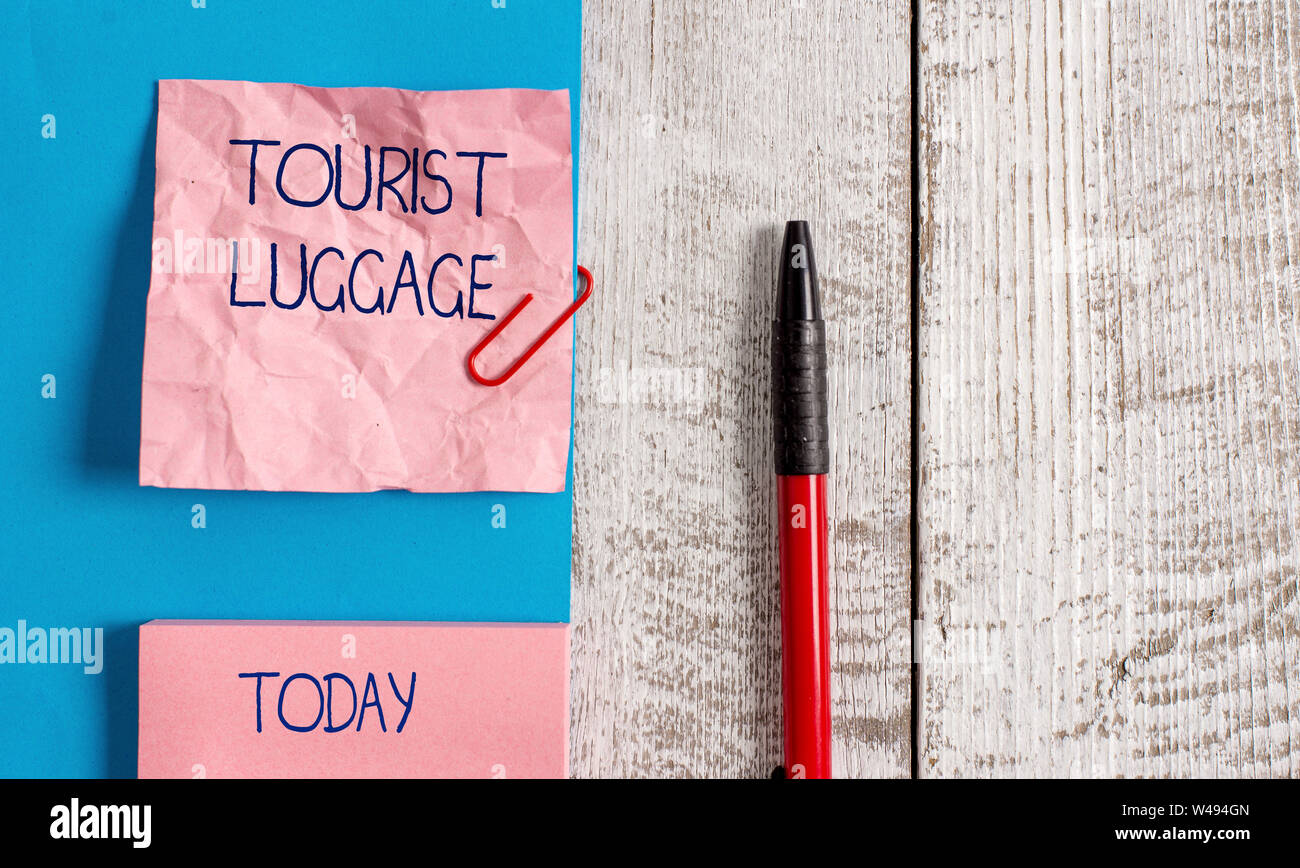 Handwriting text Tourist Luggage. Conceptual photo big bag that ...