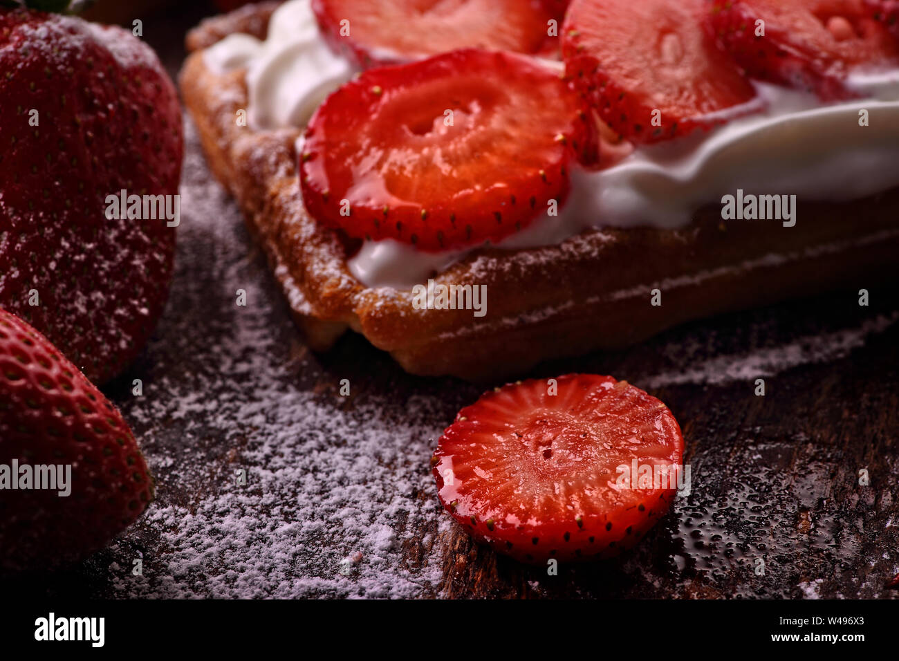crispy waffles with whipped cream and strawberries Stock Photo - Alamy