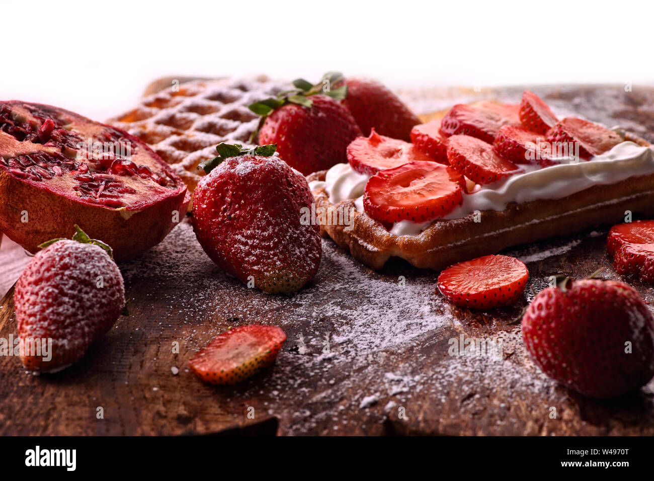 crispy waffles with whipped cream and strawberries Stock Photo - Alamy