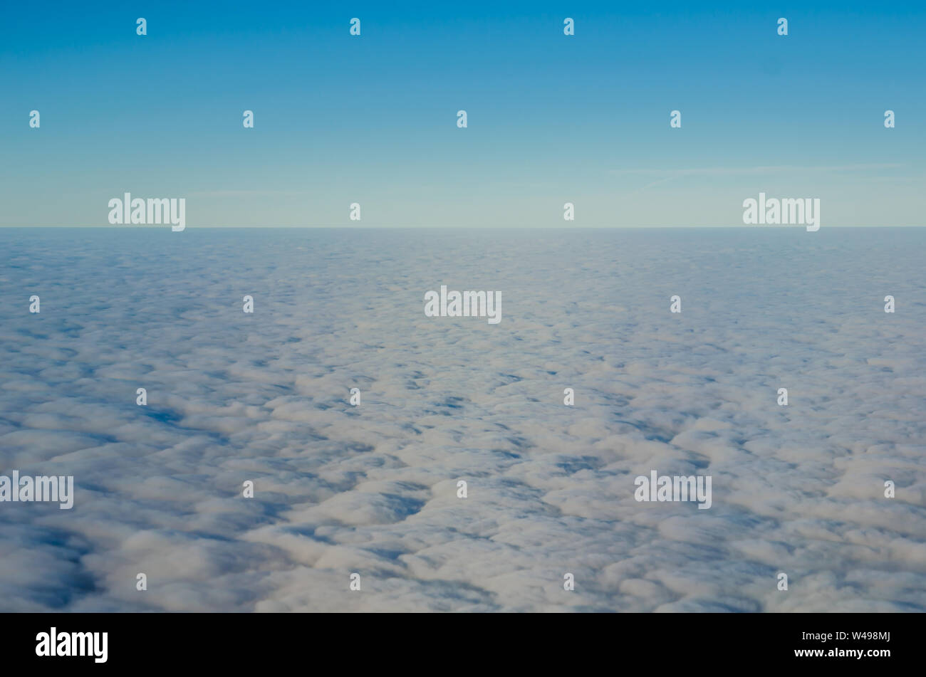 sky and clouds from the window of the plane altitude flight flight ...