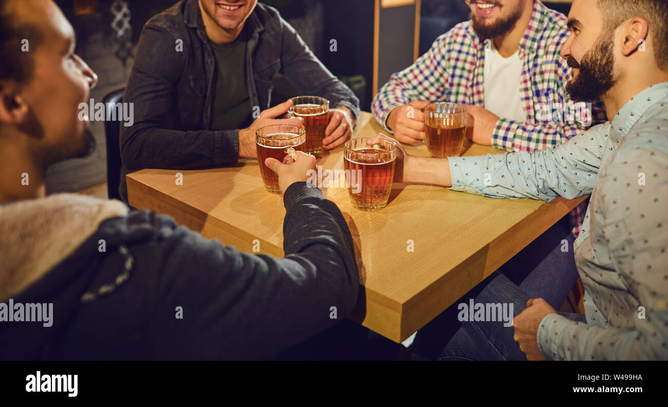 Beer friends free time concept. Cheerful friends with glasses and beer ...