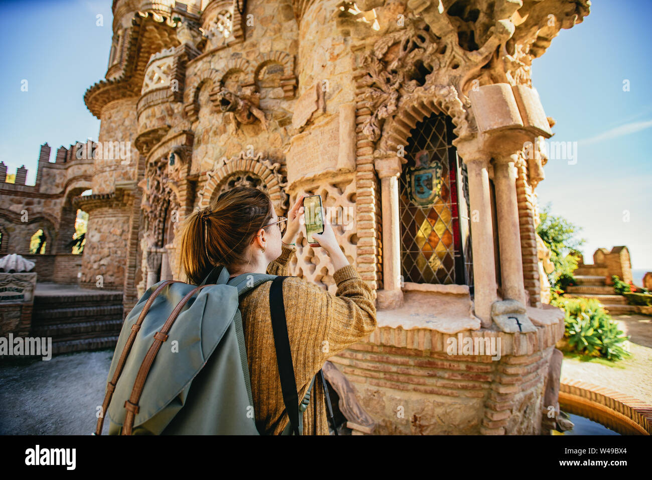 Woman photographing Spanish architecture Stock Photo - Alamy